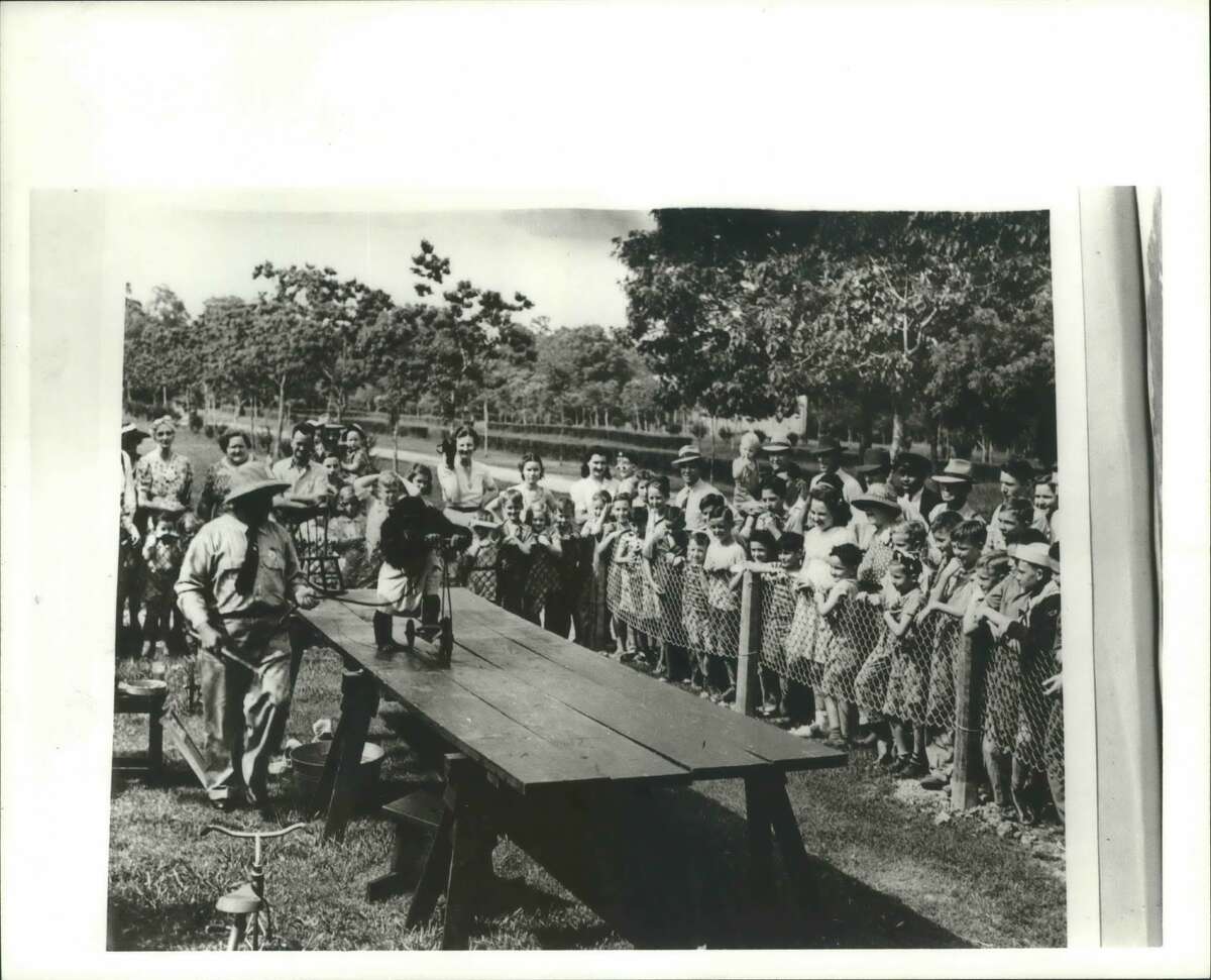 See how the Houston Zoo has evolved over the past 100 years