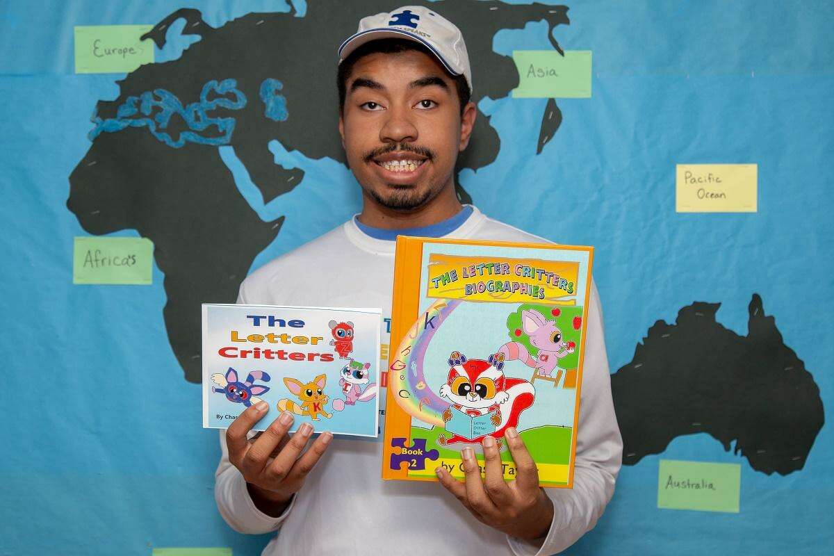 Teen with autism who found a niche makes visit to New Haven school