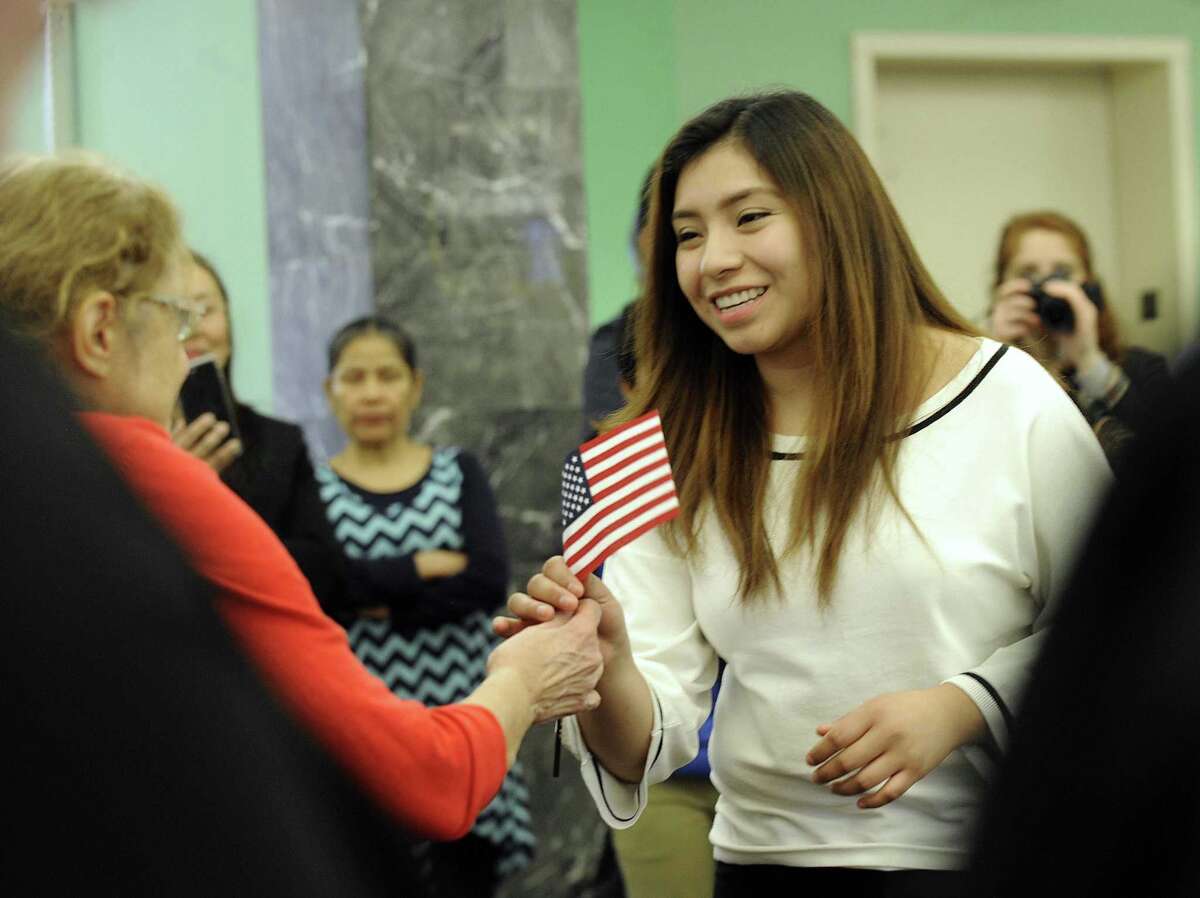 Citizenship means security for those sworn in at Danbury library