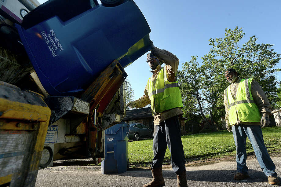 Trash collection picks up by tons post-Harvey - Beaumont Enterprise