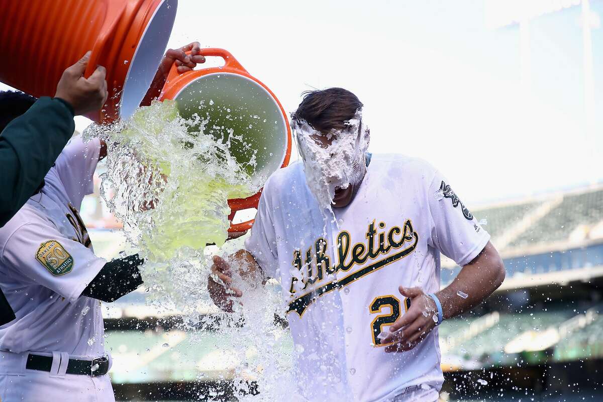 A’s Matt Olson hits walk-off single, ends 14-inning marathon
