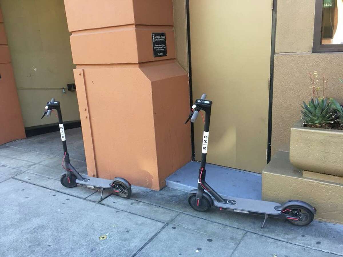 Protesters toss scooters into street to block tech buses in SF