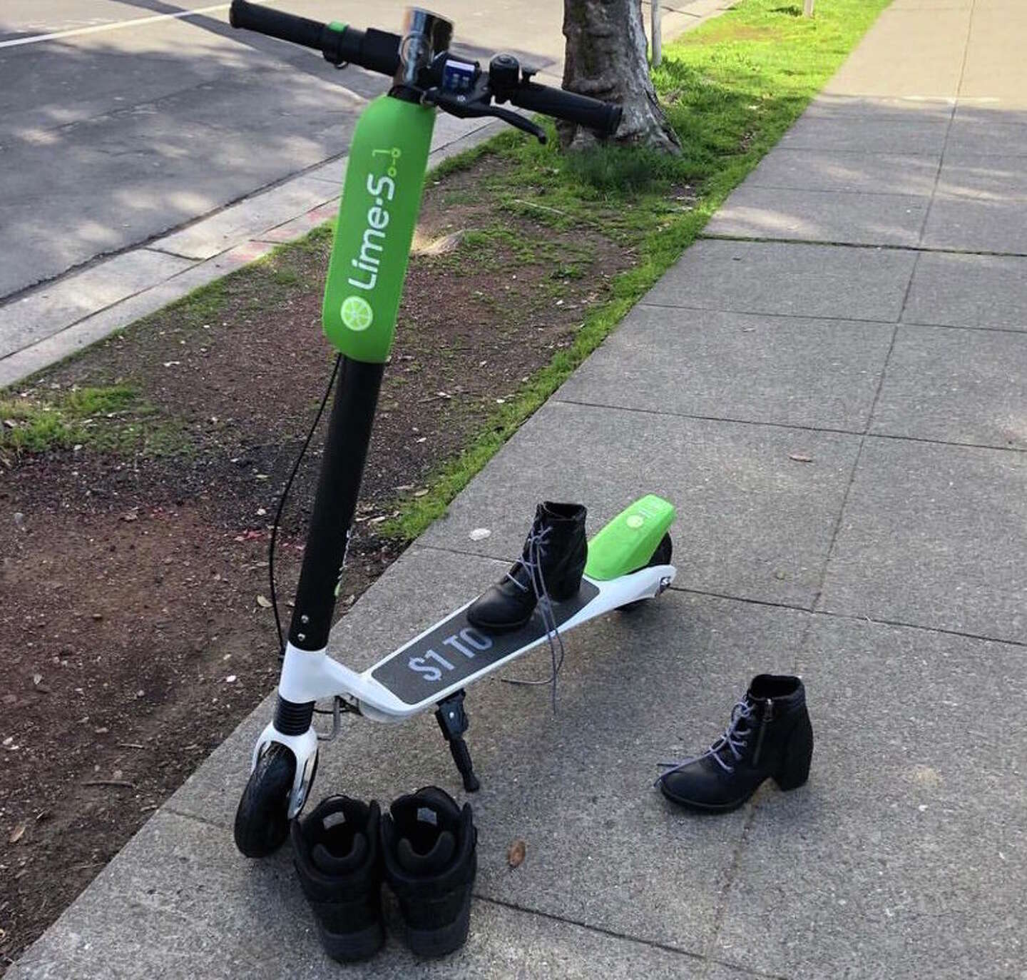 Protesters toss scooters into street to block tech buses in SF