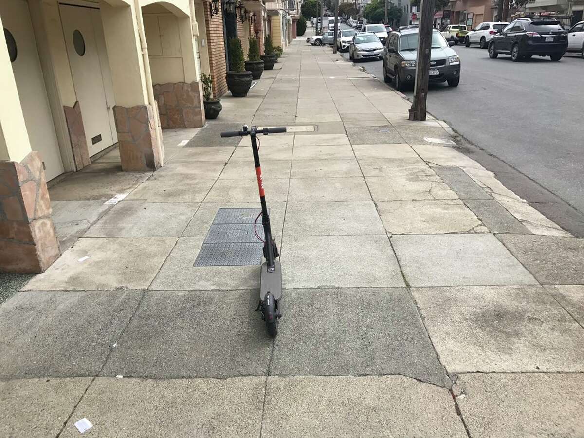 Protesters toss scooters into street to block tech buses in SF