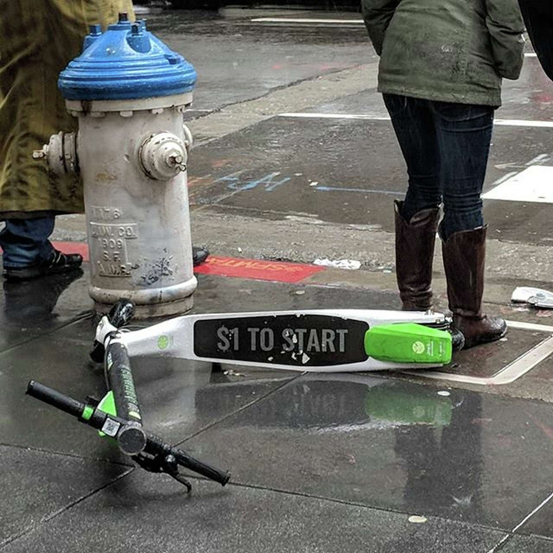Protesters toss scooters into street to block tech buses in SF