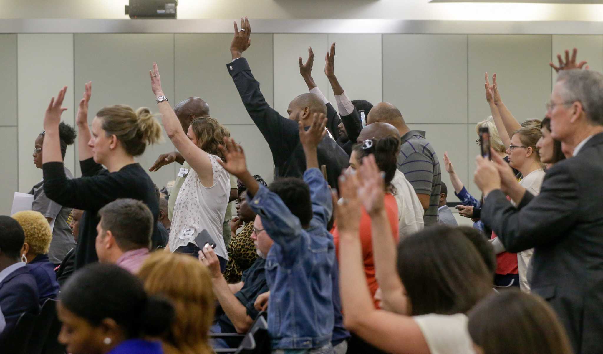 Houston ISD officials explain board room changes before raucous meeting