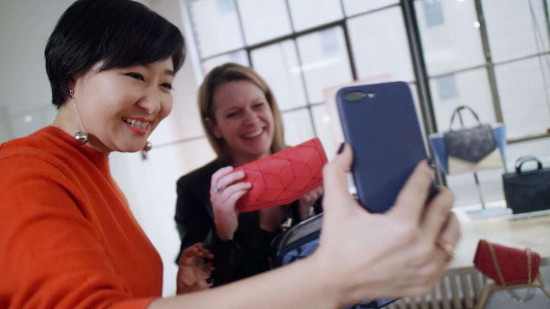 China ‘sneak peeks’ dealing aces for Norwalk bag designer