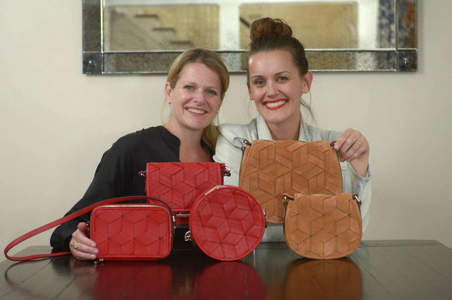 China ‘sneak peeks’ dealing aces for Norwalk bag designer