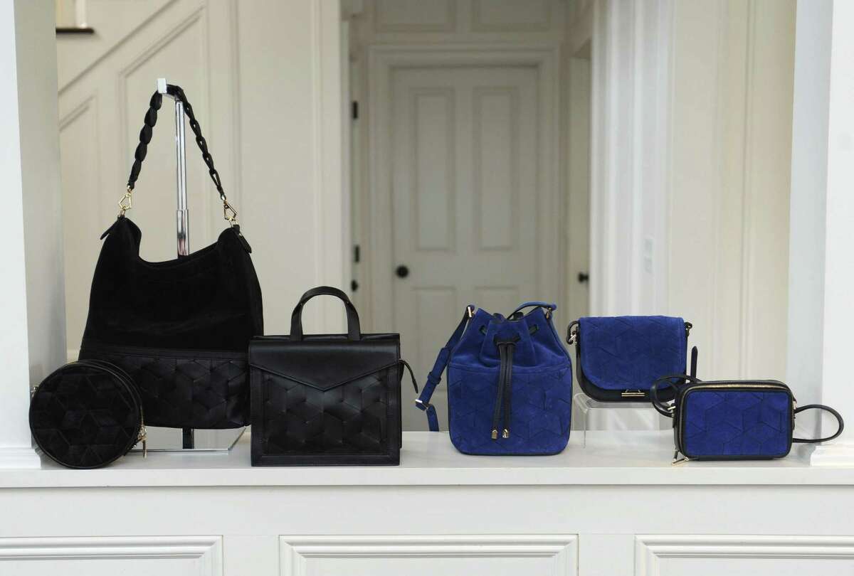 China ‘sneak peeks’ dealing aces for Norwalk bag designer