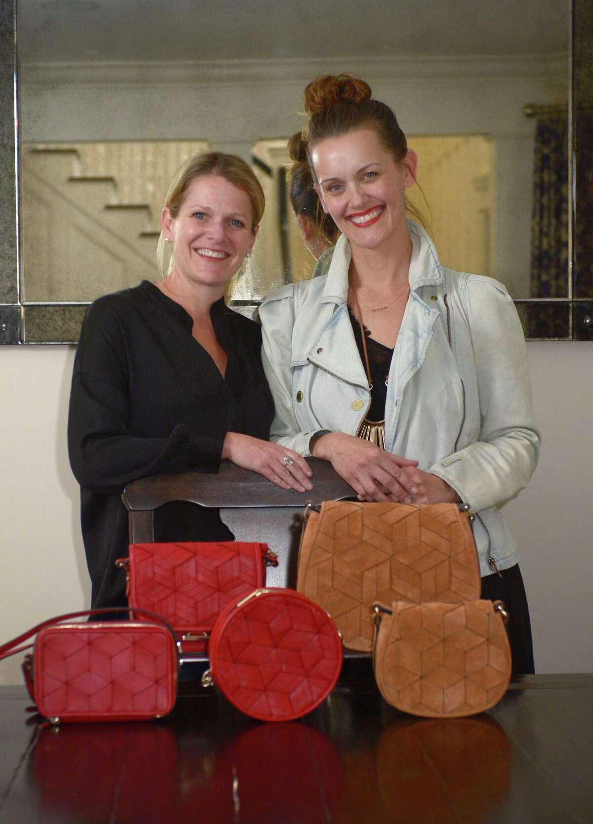 China ‘sneak peeks’ dealing aces for Norwalk bag designer