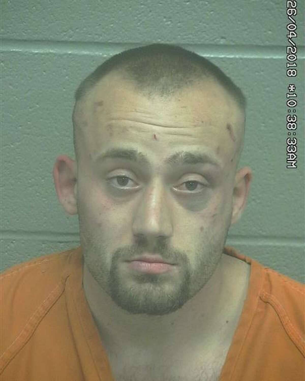 Man allegedly hits deputy with rock