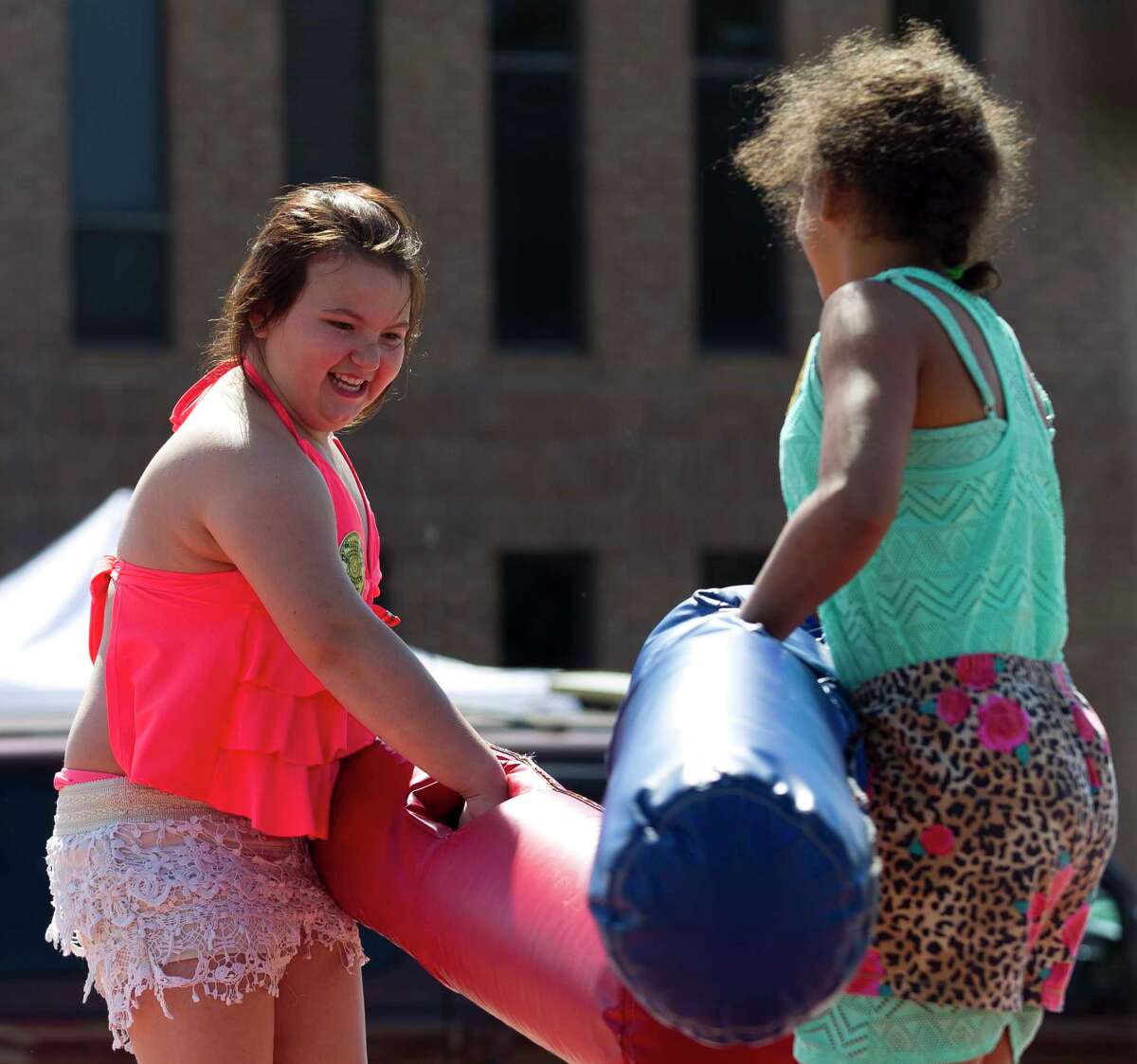 Children swing into downtown Conroe for annual Kidzfest