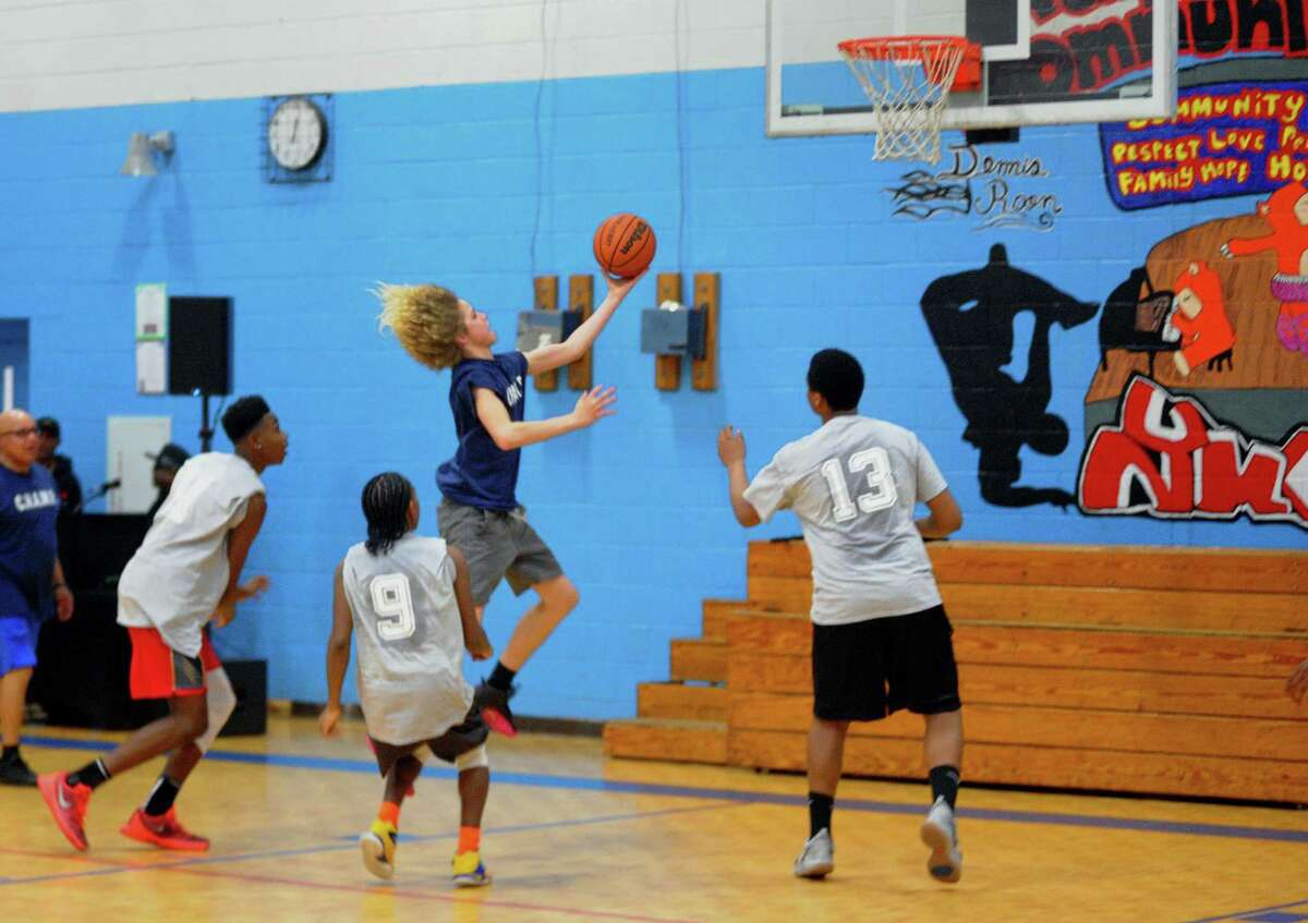 Bridgeport cops, youth team up for basketball game
