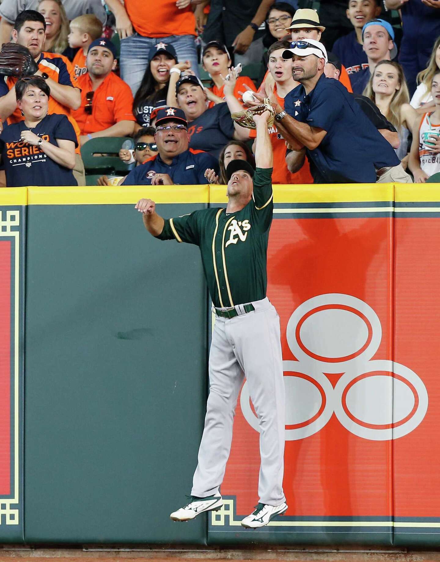 Story behind Astros fan ejected from game for interference