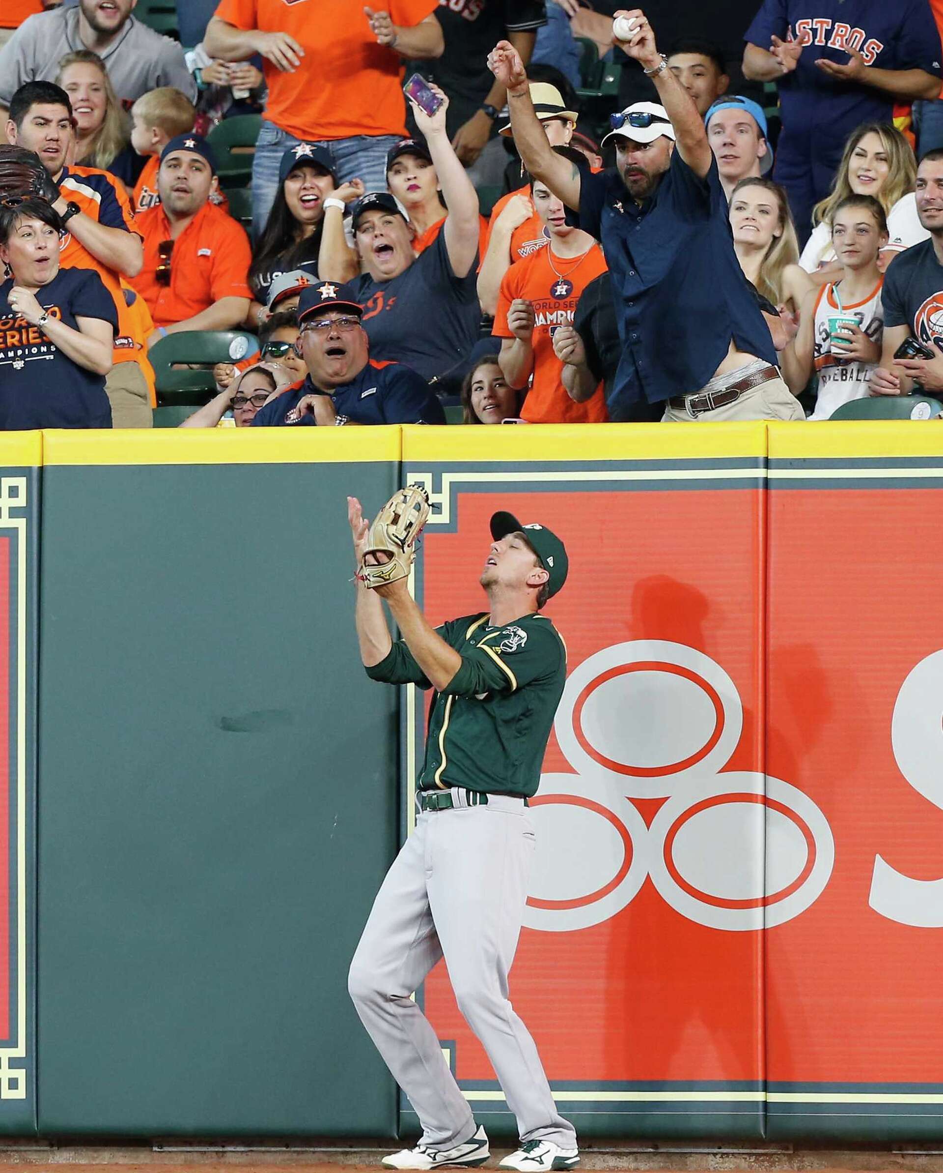 Story behind Astros fan ejected from game for interference