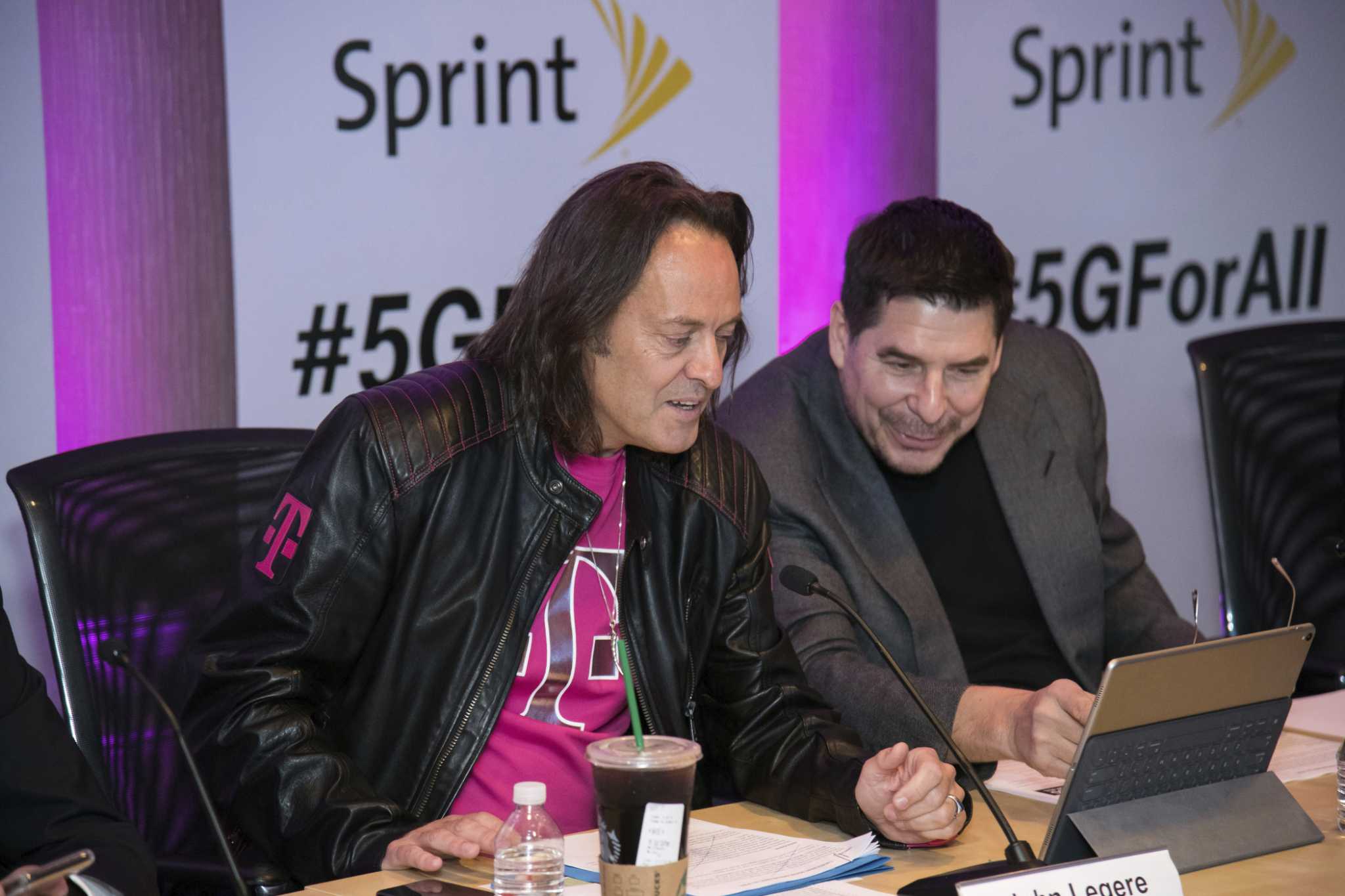 T-Mobile and Sprint CEOS turn from rivals to kindred spirits