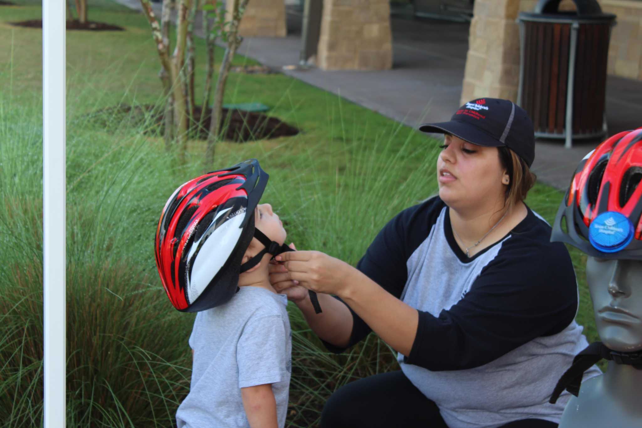 Children get safety tips during Kids Bike Rodeo in The Woodlands