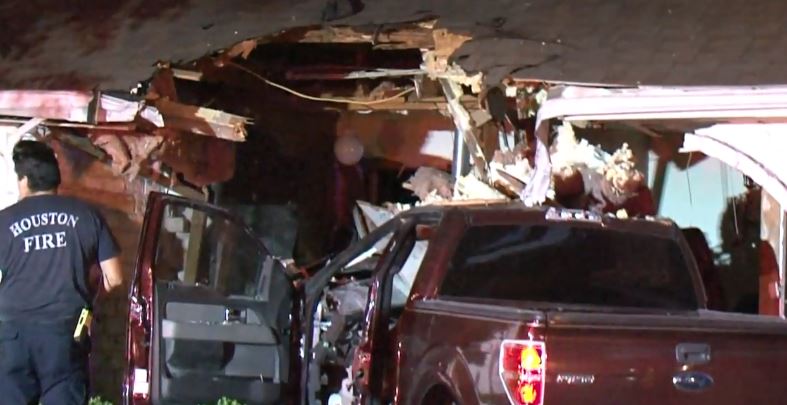 Truck plows into front of Sharpstown home