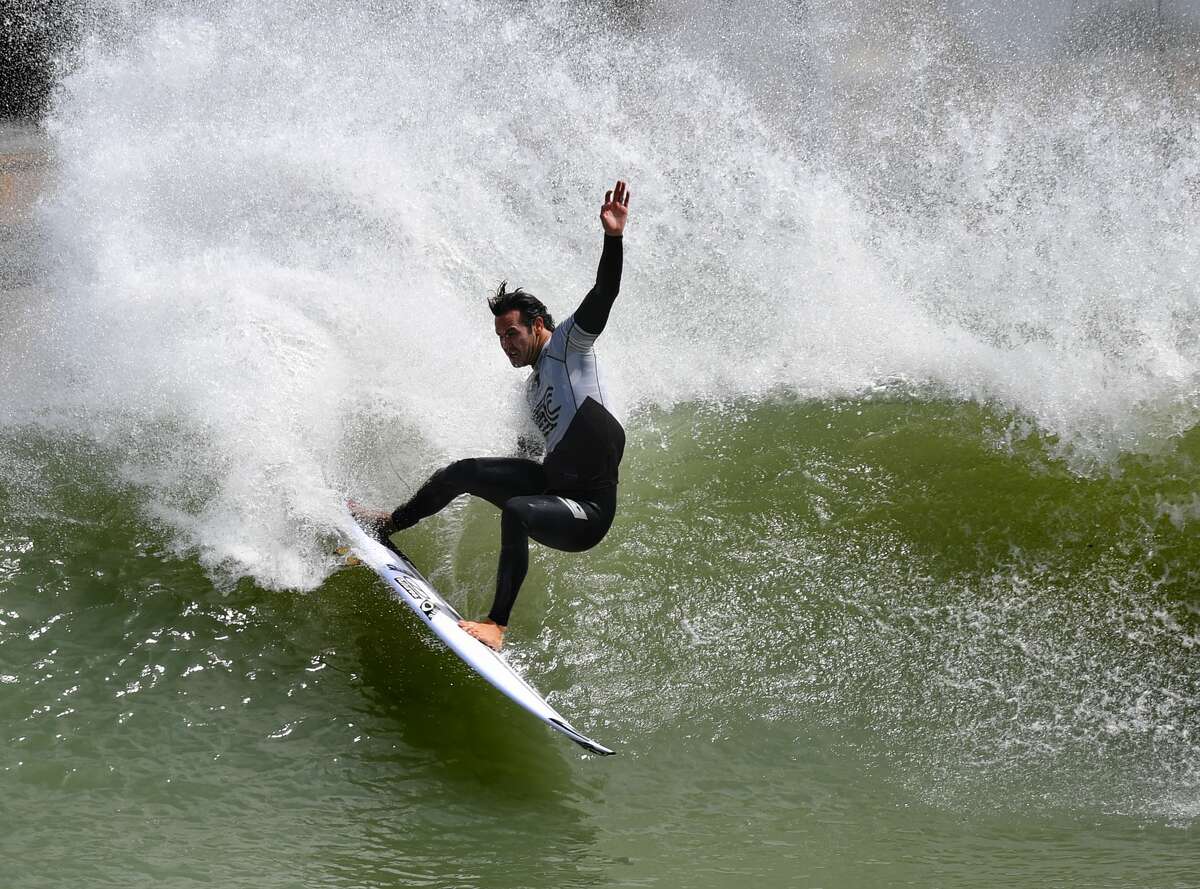 Pro surfers compete at mysterious wave facility in the middle of the ...