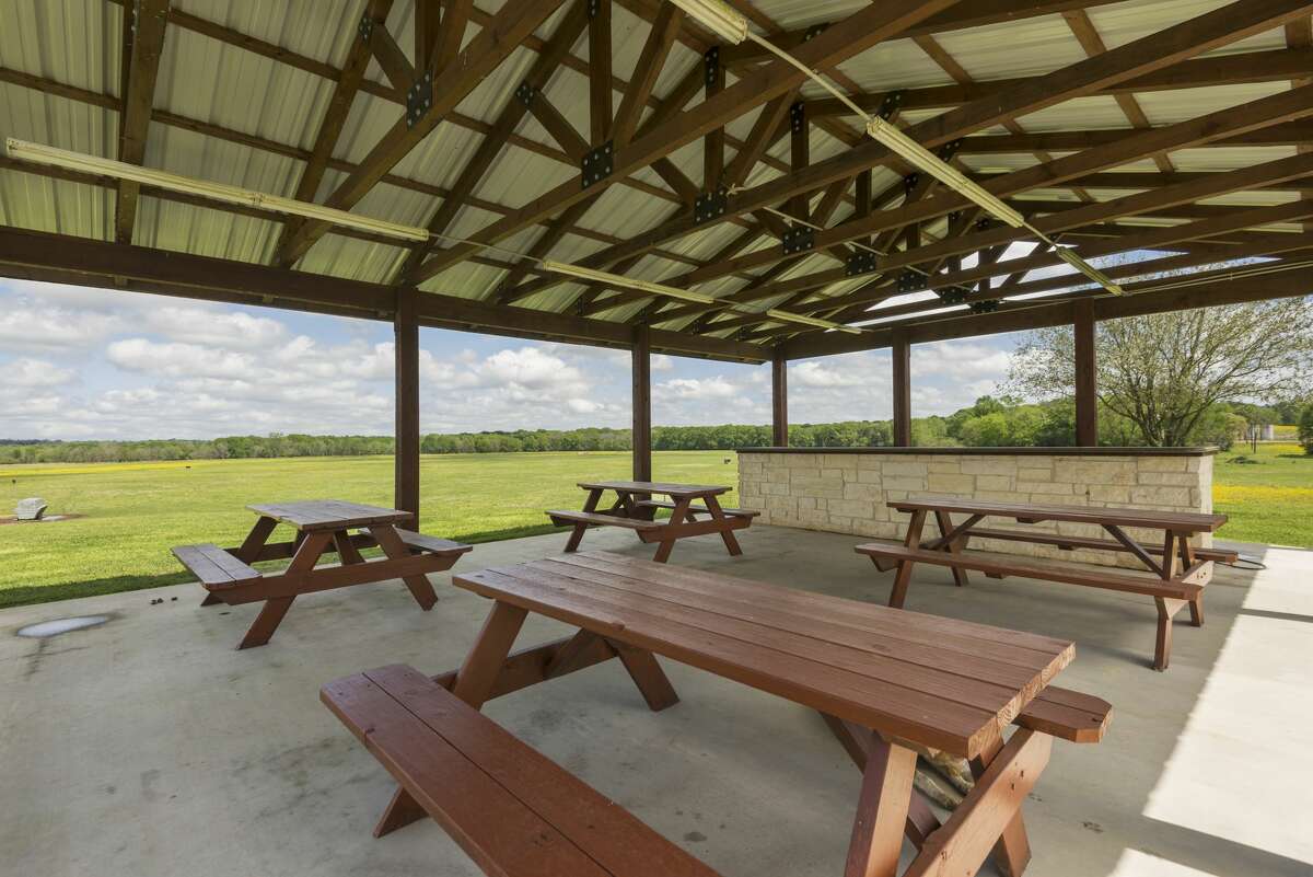 Saloon, private lake, and a personal peach orchard all come with ...