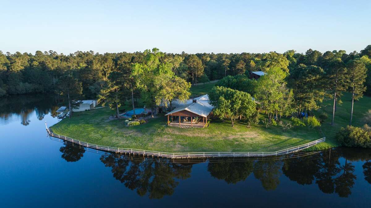 Saloon, private lake, and a personal peach orchard all come with ...