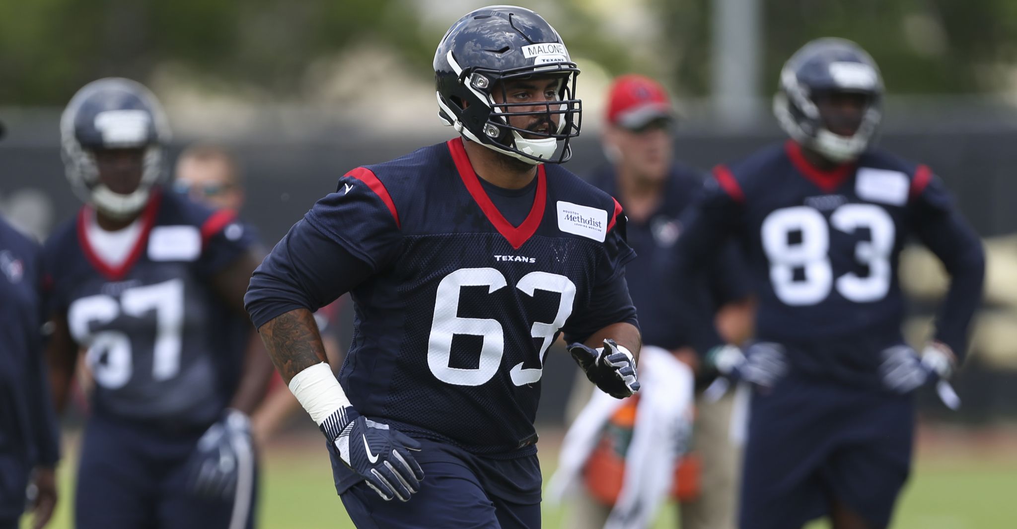 Texans OT K.J. Malone, Karl Malone's son, retires