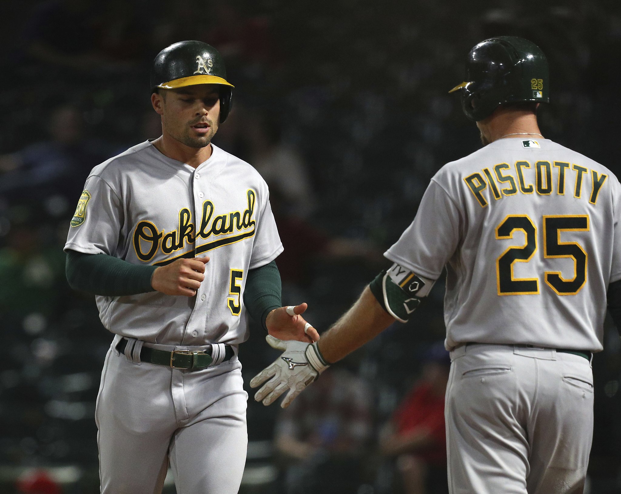Jake Smolinski takes demotion in stride, A’s manager says
