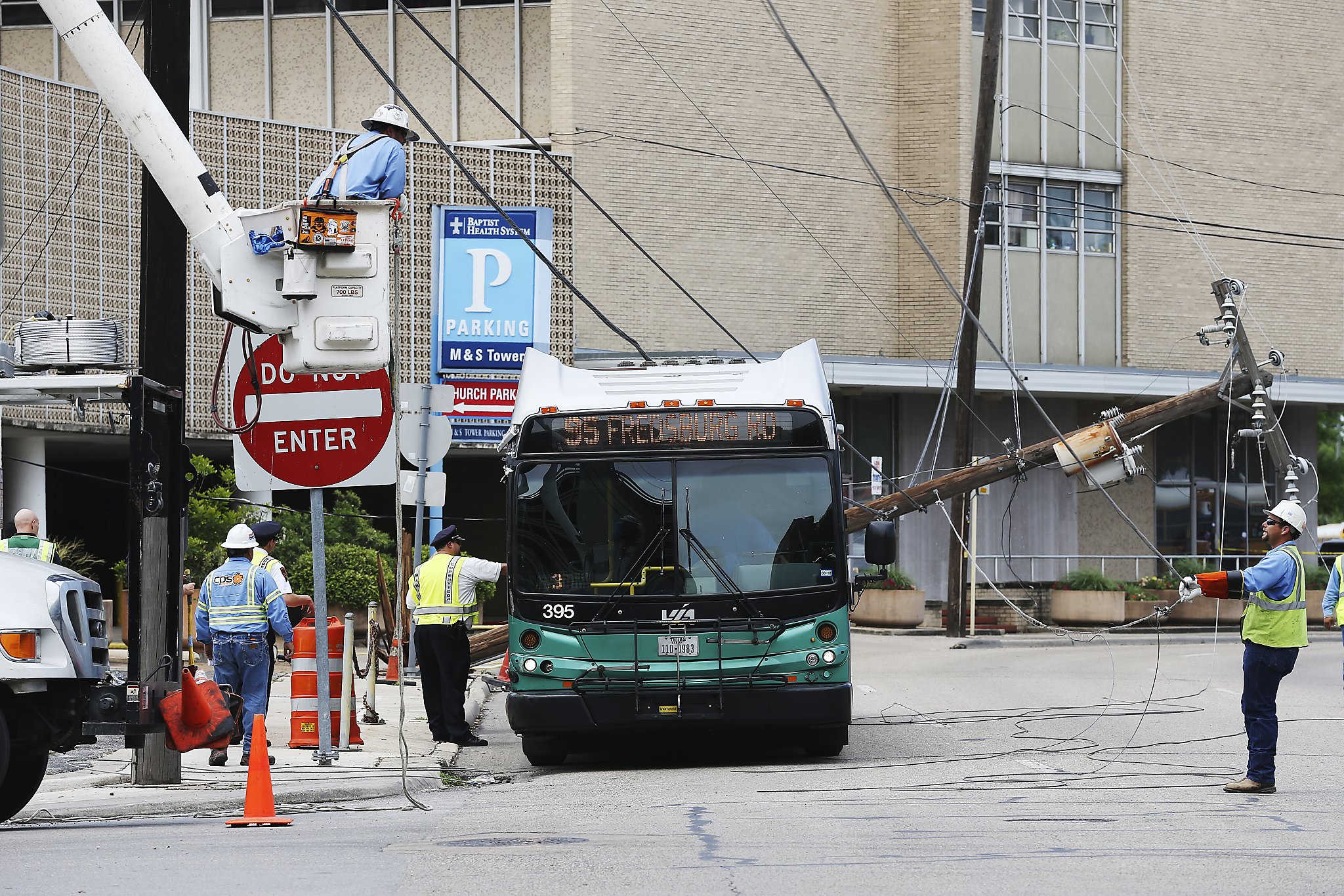 VIA bus clips pole, bringing down power lines