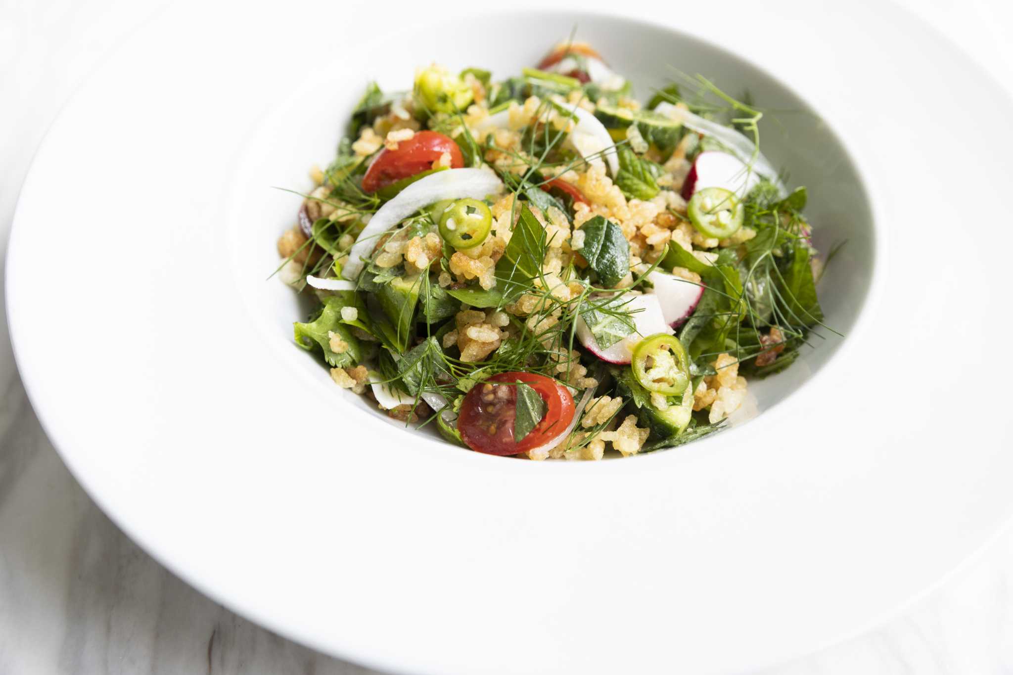 The crispy rice salad at Chris Shepherd’s UB Preserv is a showstopper