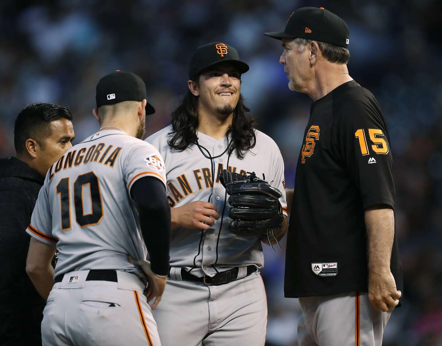 Giants lose two pitchers to injuries, fall again to Rockies