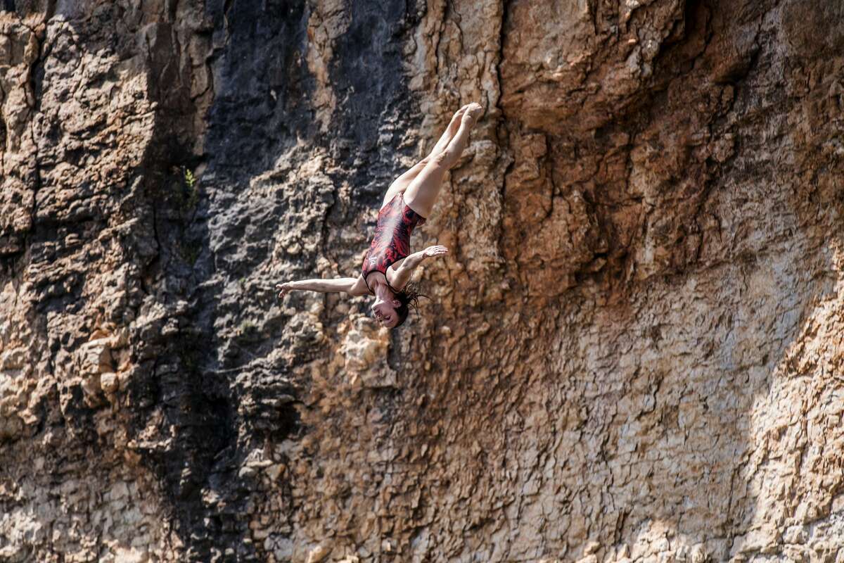Stunning photos show people cliff diving from Texas' Hell's Gate