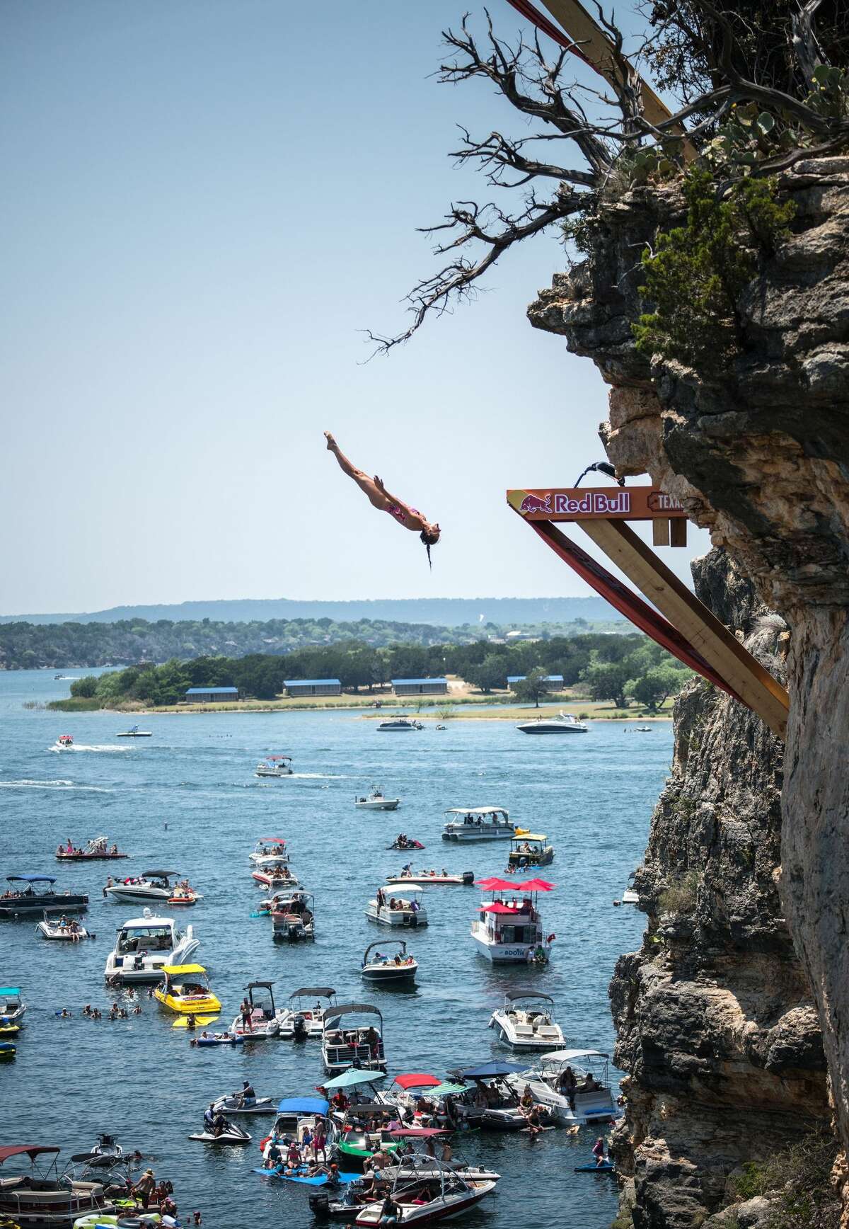 Stunning photos show people cliff diving from Texas' Hell's Gate