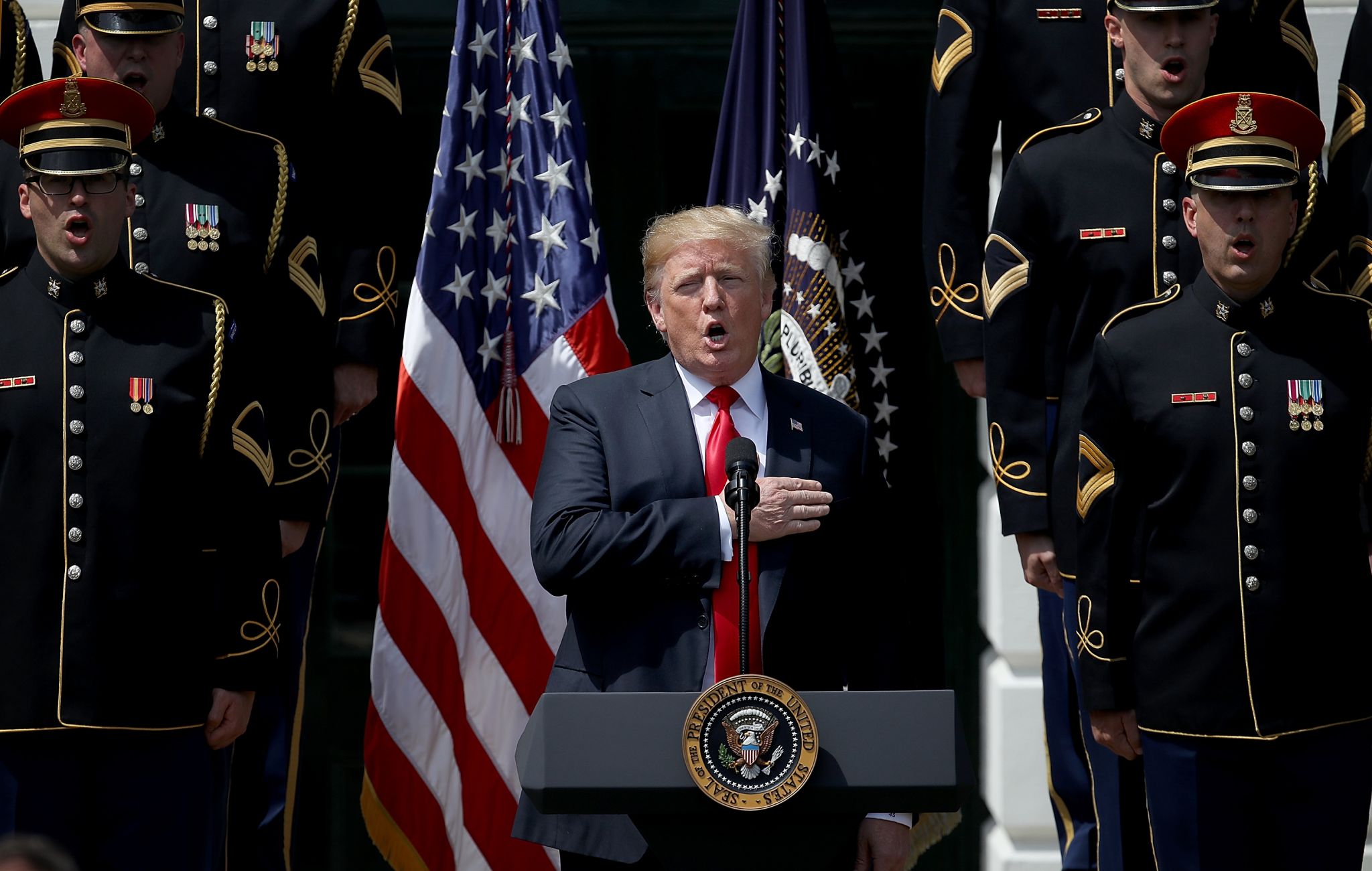 Two men take a knee at Donald Trump's 'Celebration of America' event