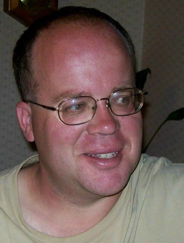 Scouts plant trees in memory of Bill Rundall