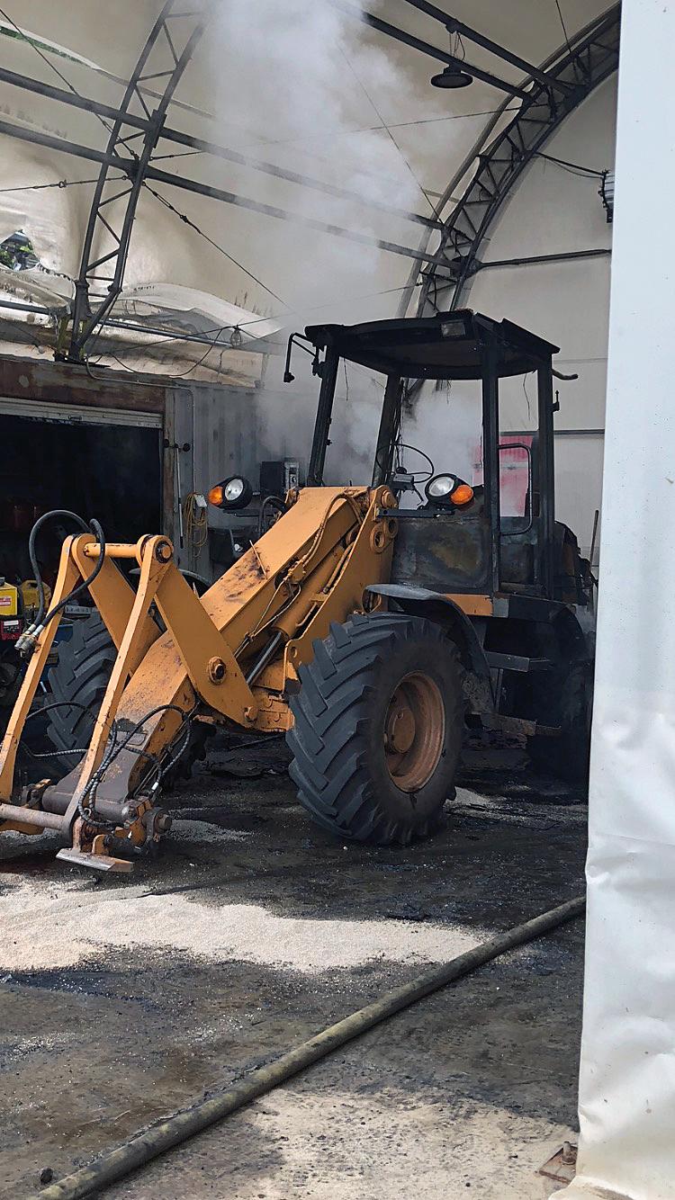 Monroe Fire Marshal: Tractor fire causes $100K in damages