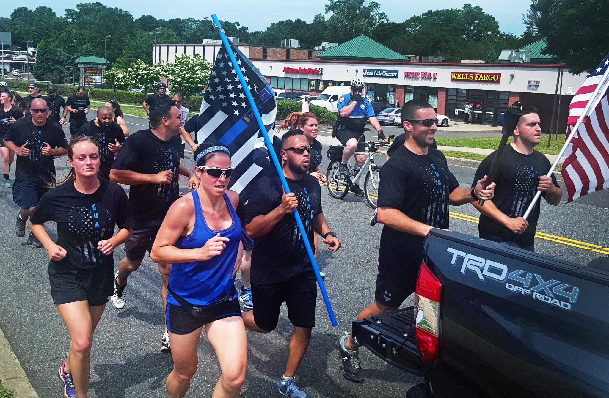 Law enforcement carries torch for Special Olympics