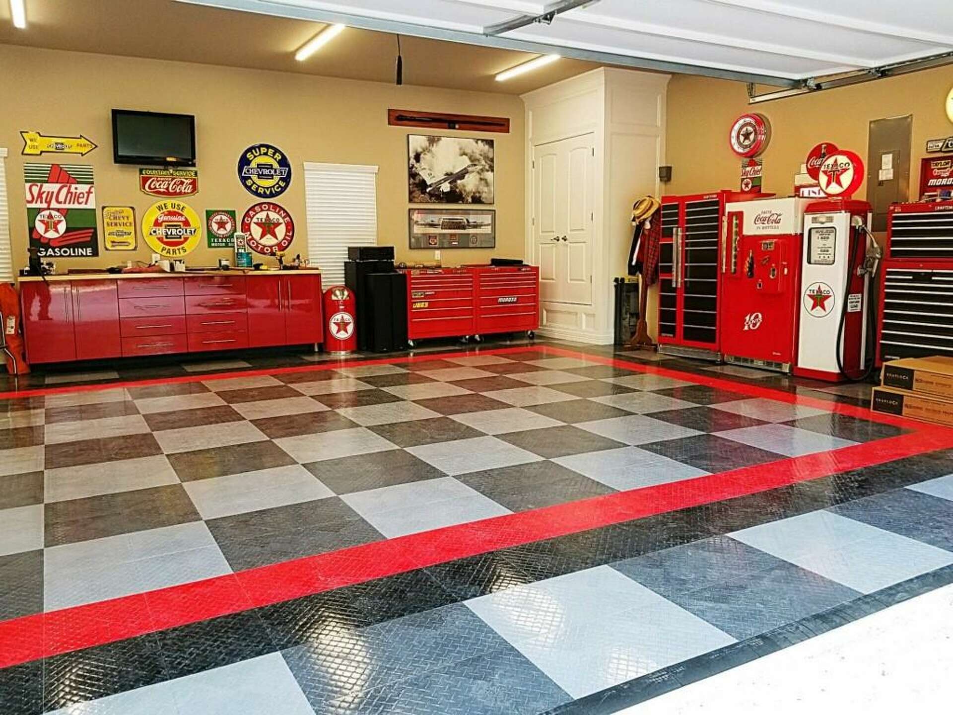 The tricked-out, high-end garages you will dream of