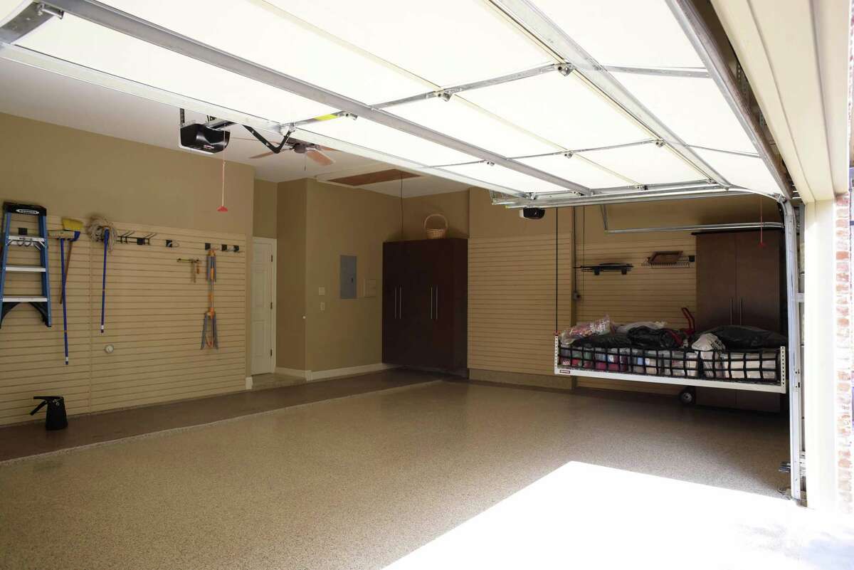 The tricked-out, high-end garages you will dream of