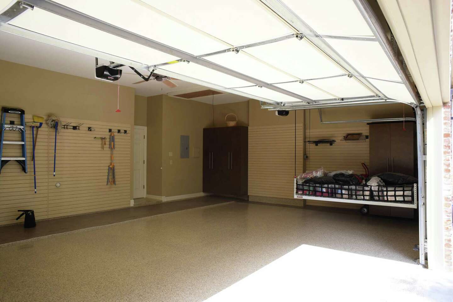 The tricked-out, high-end garages you will dream of