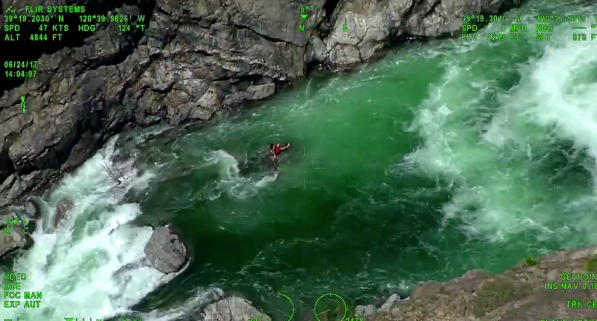 Incredible video shows rescue of man stuck between two massive ...