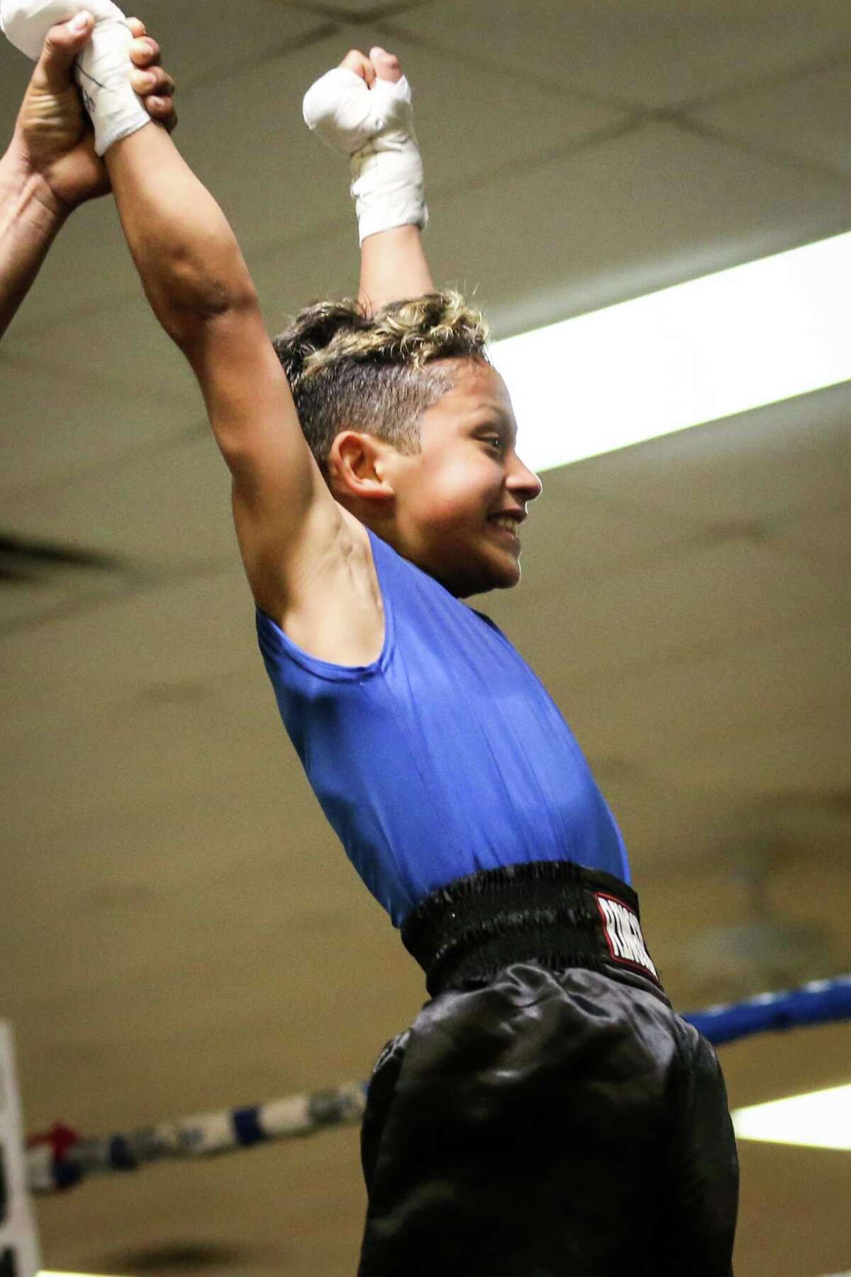 First responders touch gloves for nonprofit Fearless Boxing Gym