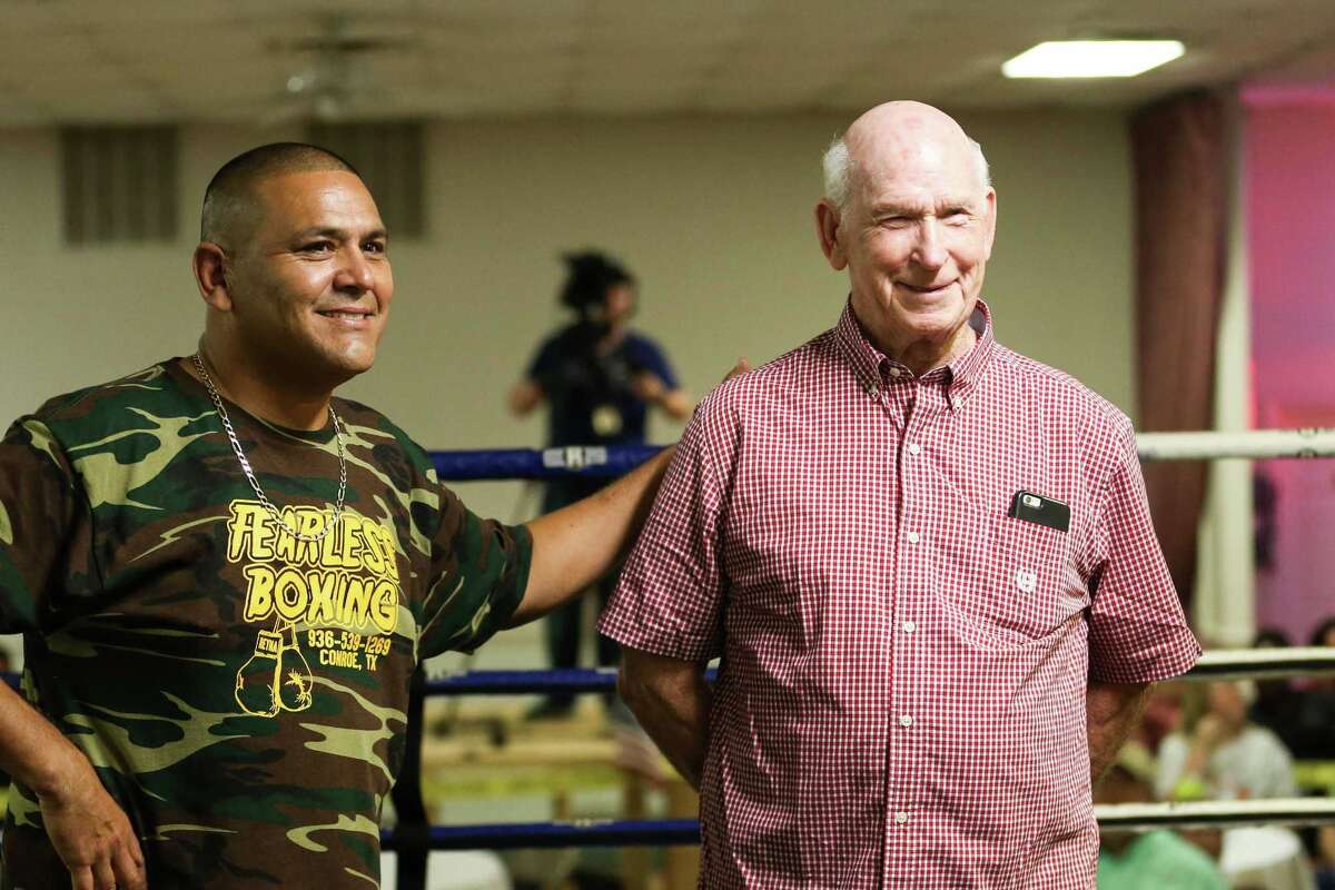 First responders touch gloves for nonprofit Fearless Boxing Gym