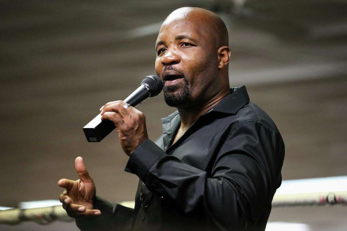 First responders touch gloves for nonprofit Fearless Boxing Gym