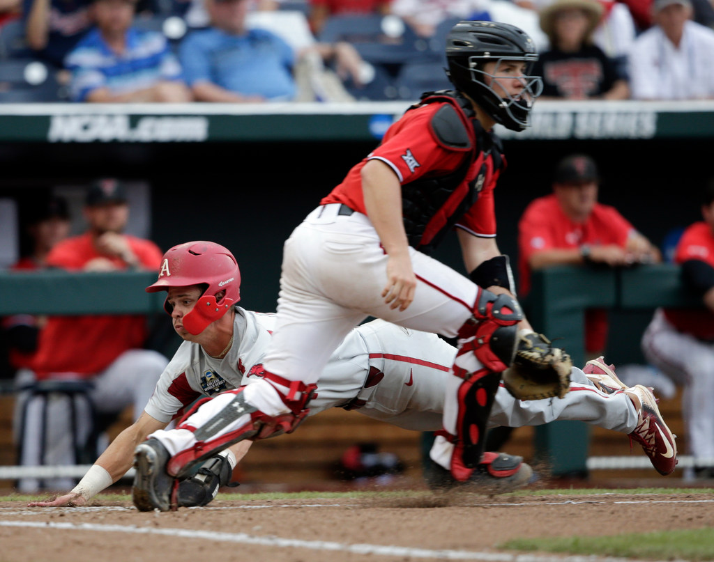 Fletcher's bat helps Arkansas beat Red Raiders 7-4 at CWS