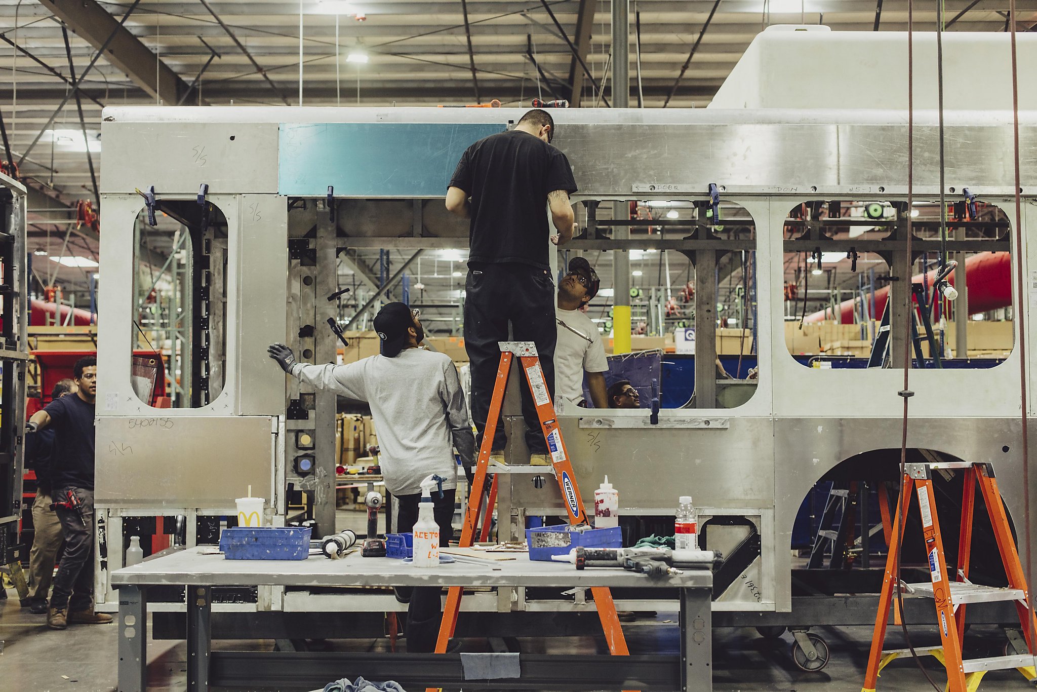 Buses, delivery vans and garbage trucks are the electric vehicles next door