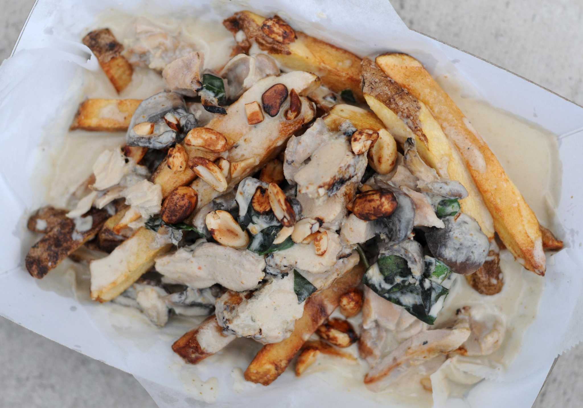 Food truck’s Duo Cuisine french fries sizzle with Thai curry sauce