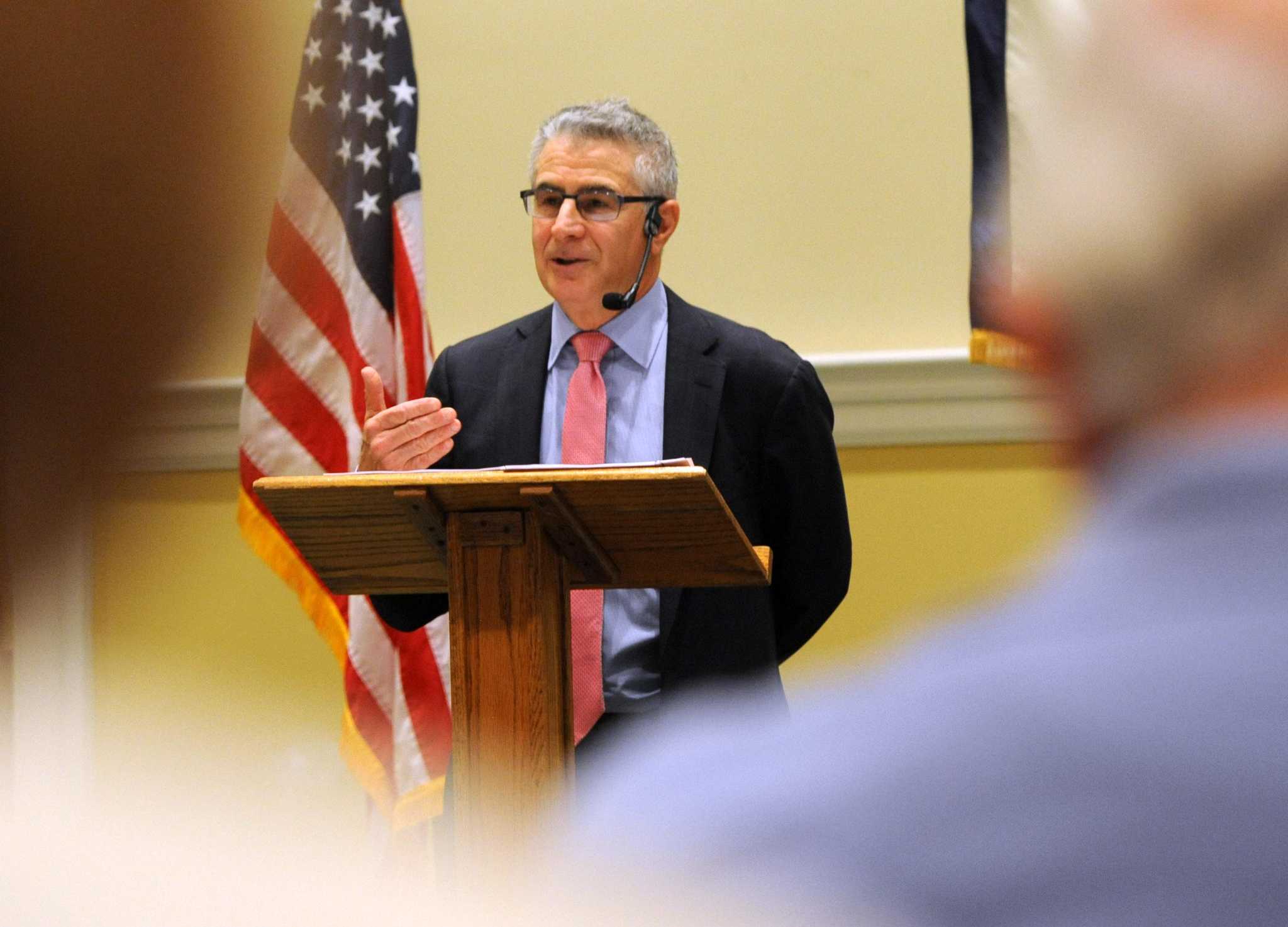 Economist praises tax cut but offers a warning in Greenwich talk