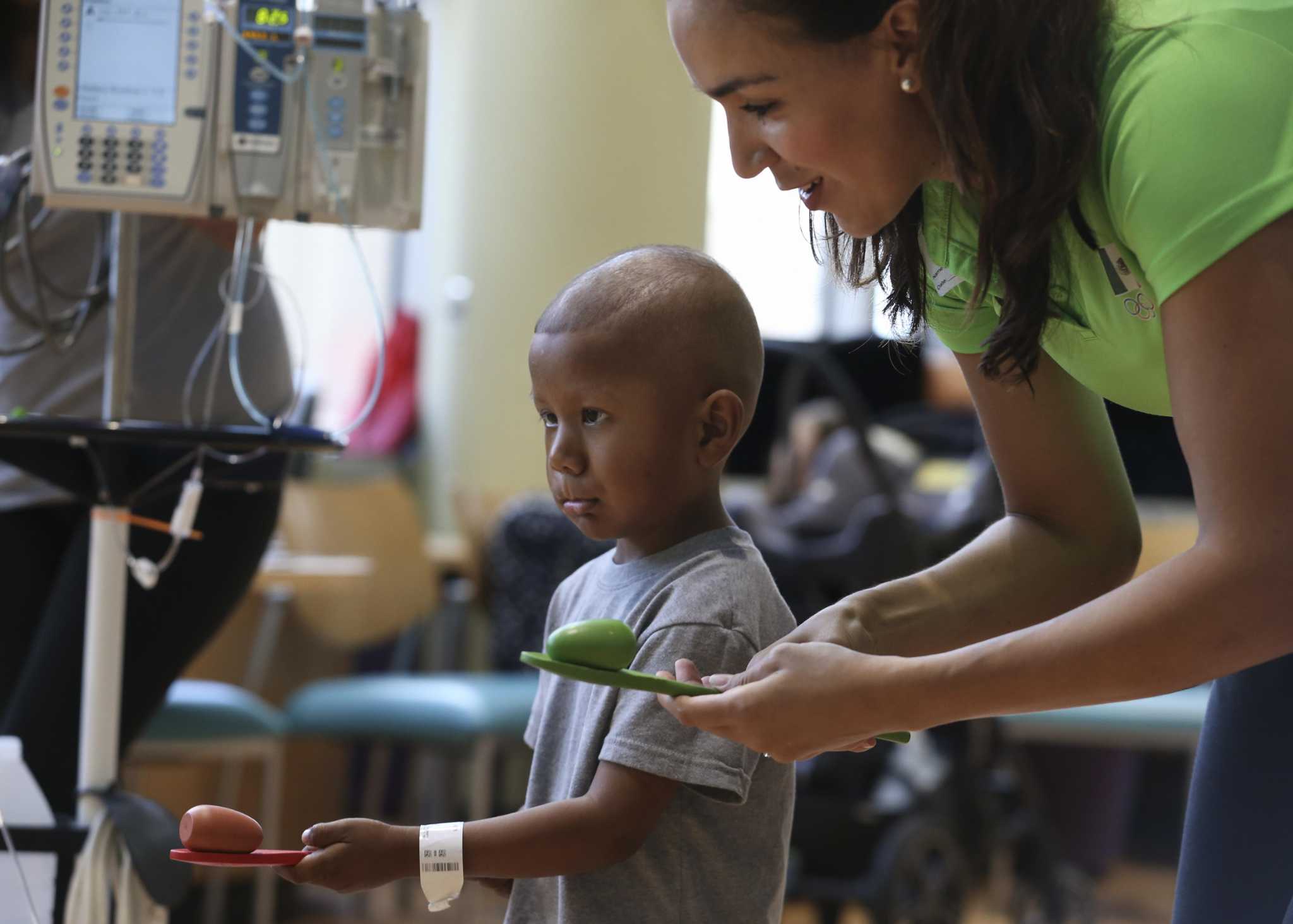 Olympic athlete engages pediatric cancer patients in MD Anderson ...