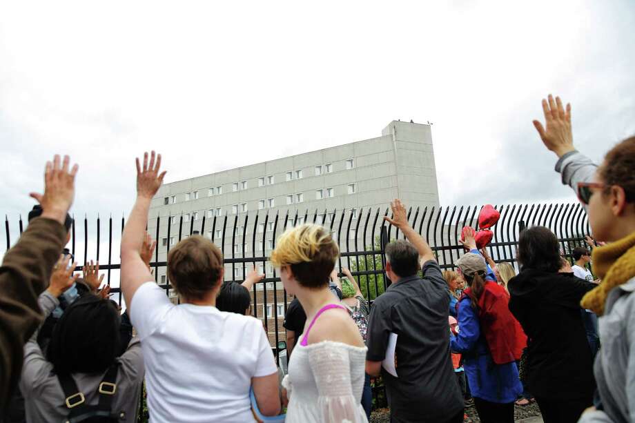 Connelly: 10,000 rally, register, write letters at feds' SeaTac ...