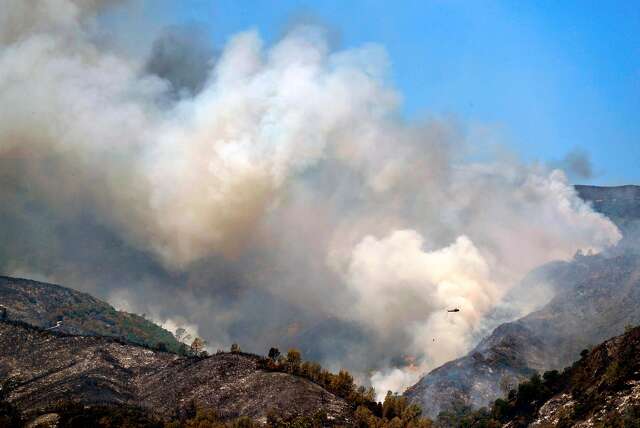 County Fire ‘growing a lot faster’ than past blazes, spreads glow and ...